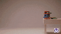 Books Falling Off Shelf Gif