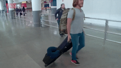 Running With Suitcase Gif