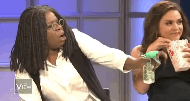 Spraying The View GIF by Saturday Night Live - Find & Share on GIPHY